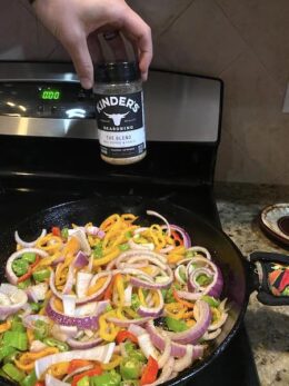 Easy Outdoor Cast Iron Sausage and Peppers Skillet - Beyond The Tent
